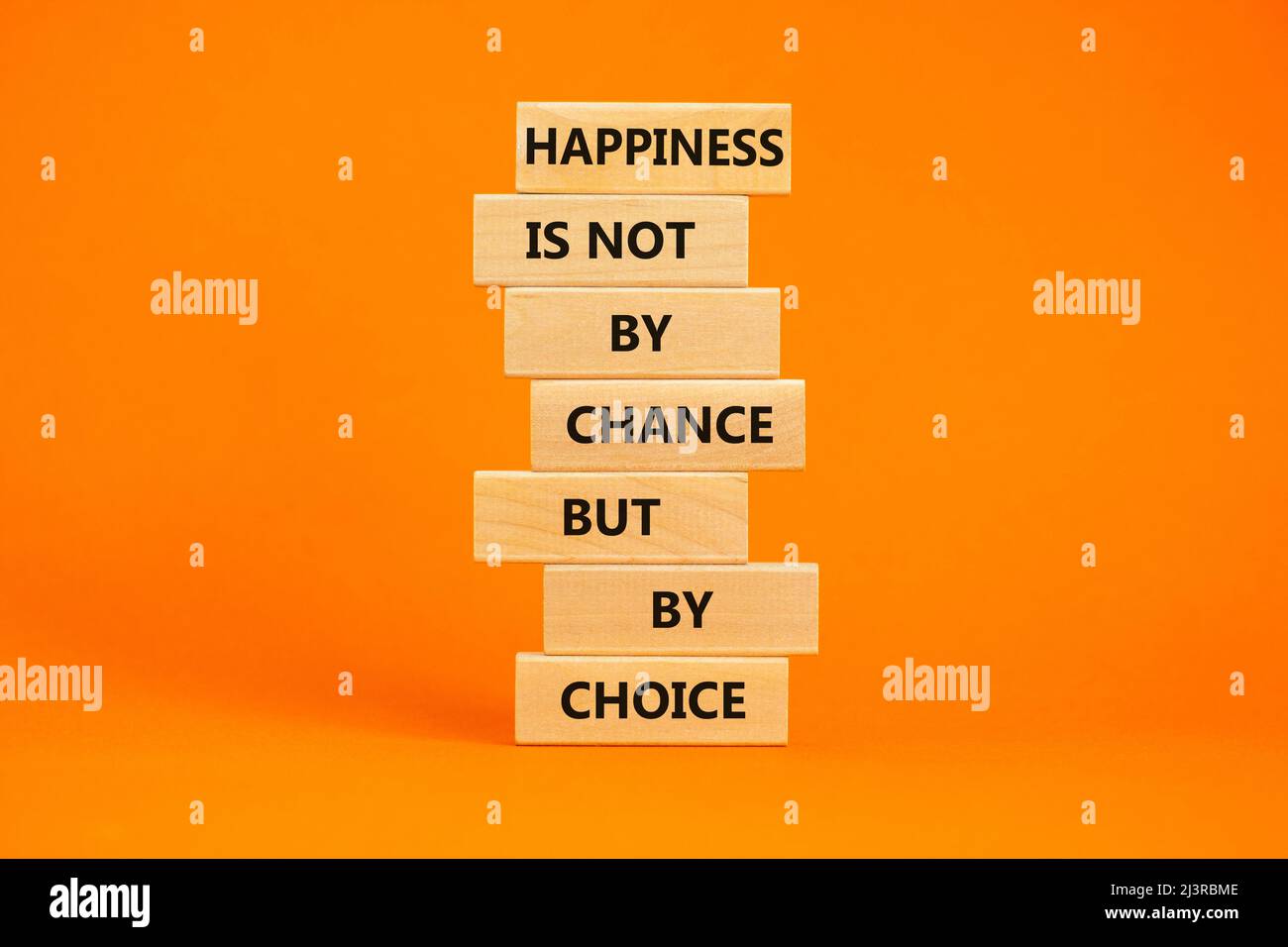 Happiness is choice symbol. Wooden blocks with words Happiness is not ...