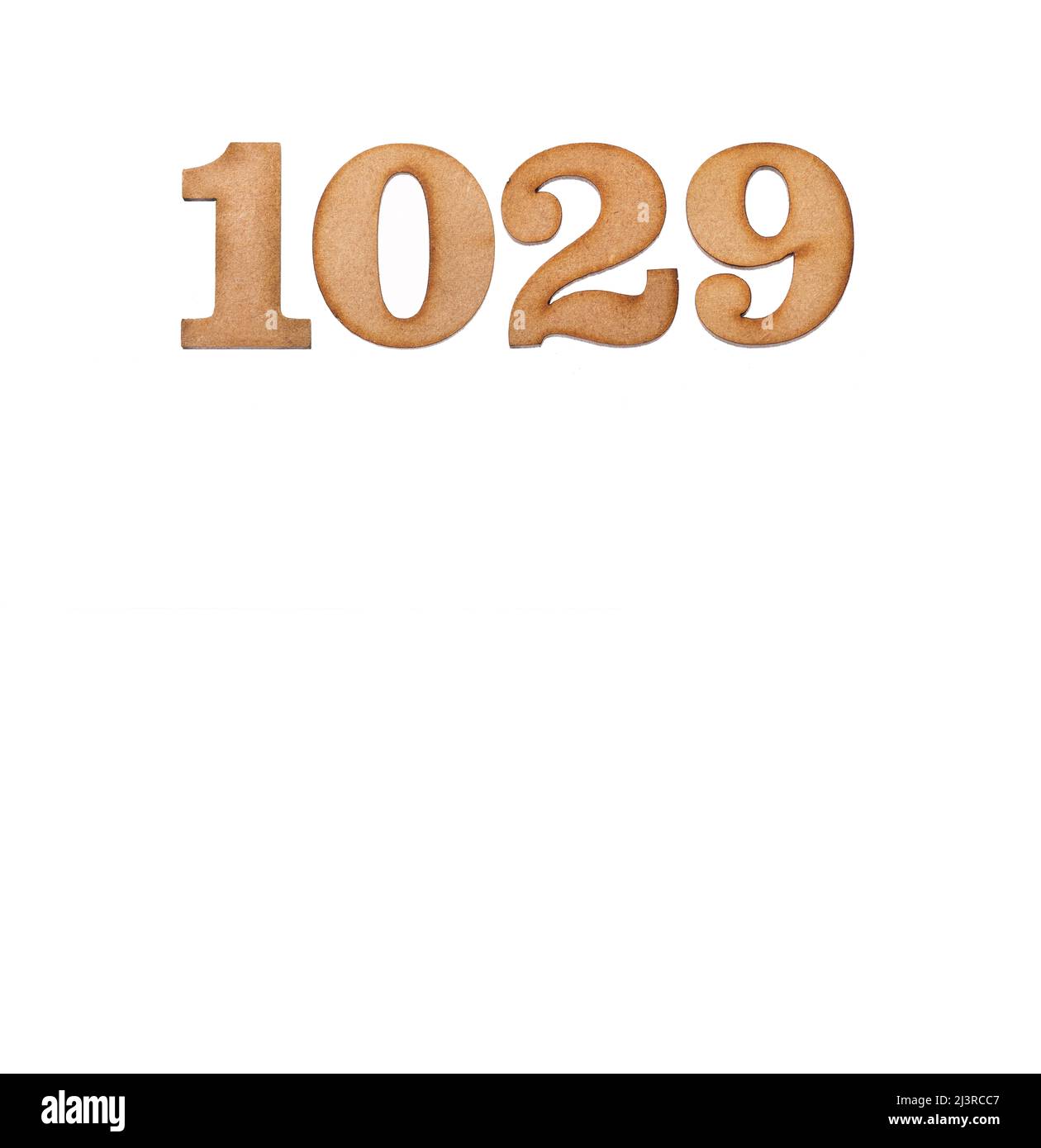 Number 1029 in wood, isolated on white background Stock Photo - Alamy