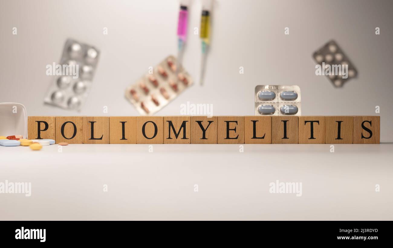 poliomyelitis disease. It was created from wooden cubes. Disease and ...