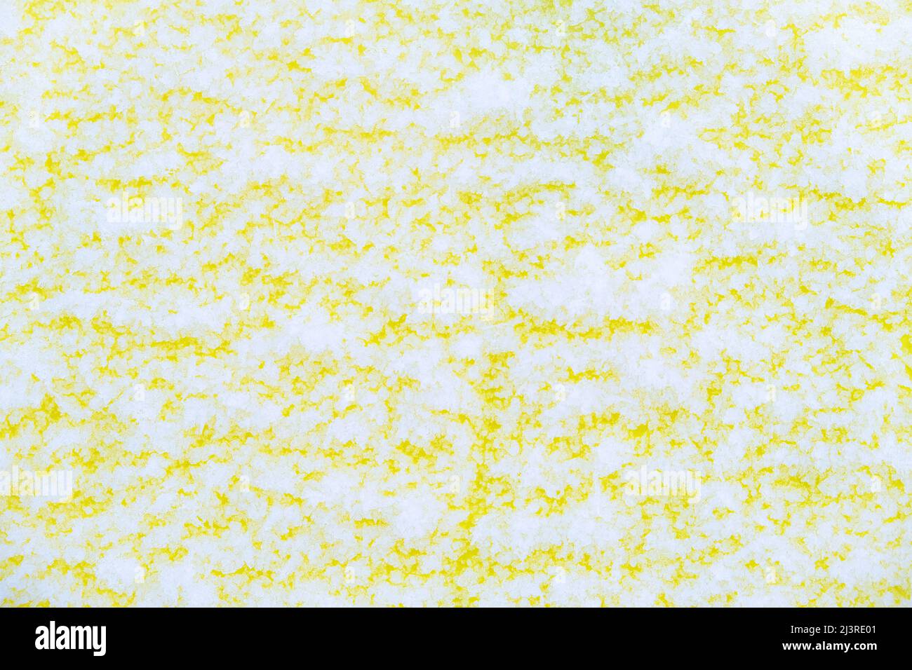 The yellow wall is covered with snow patterns. Frost on the painted ...