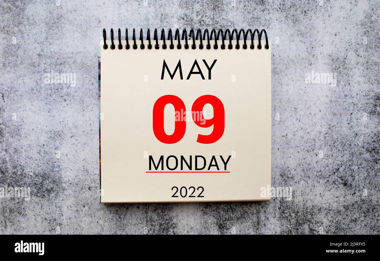 may 9. 9th day of month, calendar date.White vase with dried flowers on ...