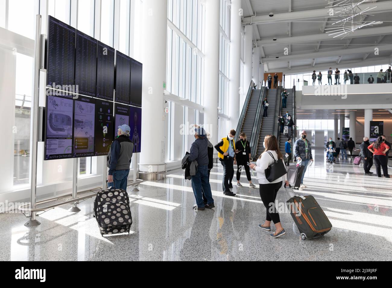SeaTac, Washington, USA. 9th April, 2022. Volunteers check the flight ...
