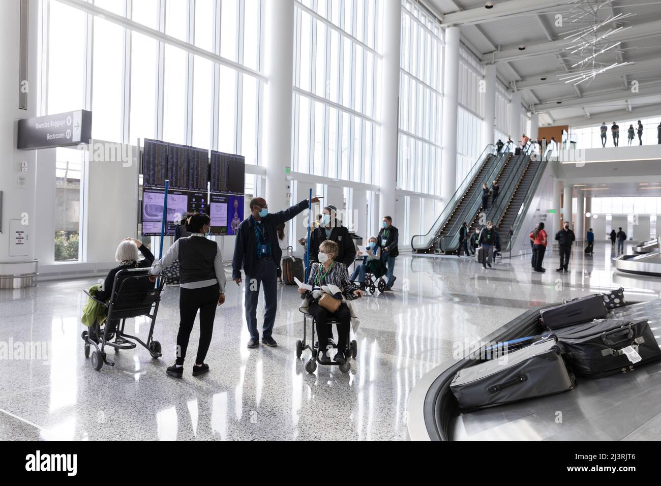 SeaTac, Washington, USA. 9th April, 2022. Employees guide volunteers at ...