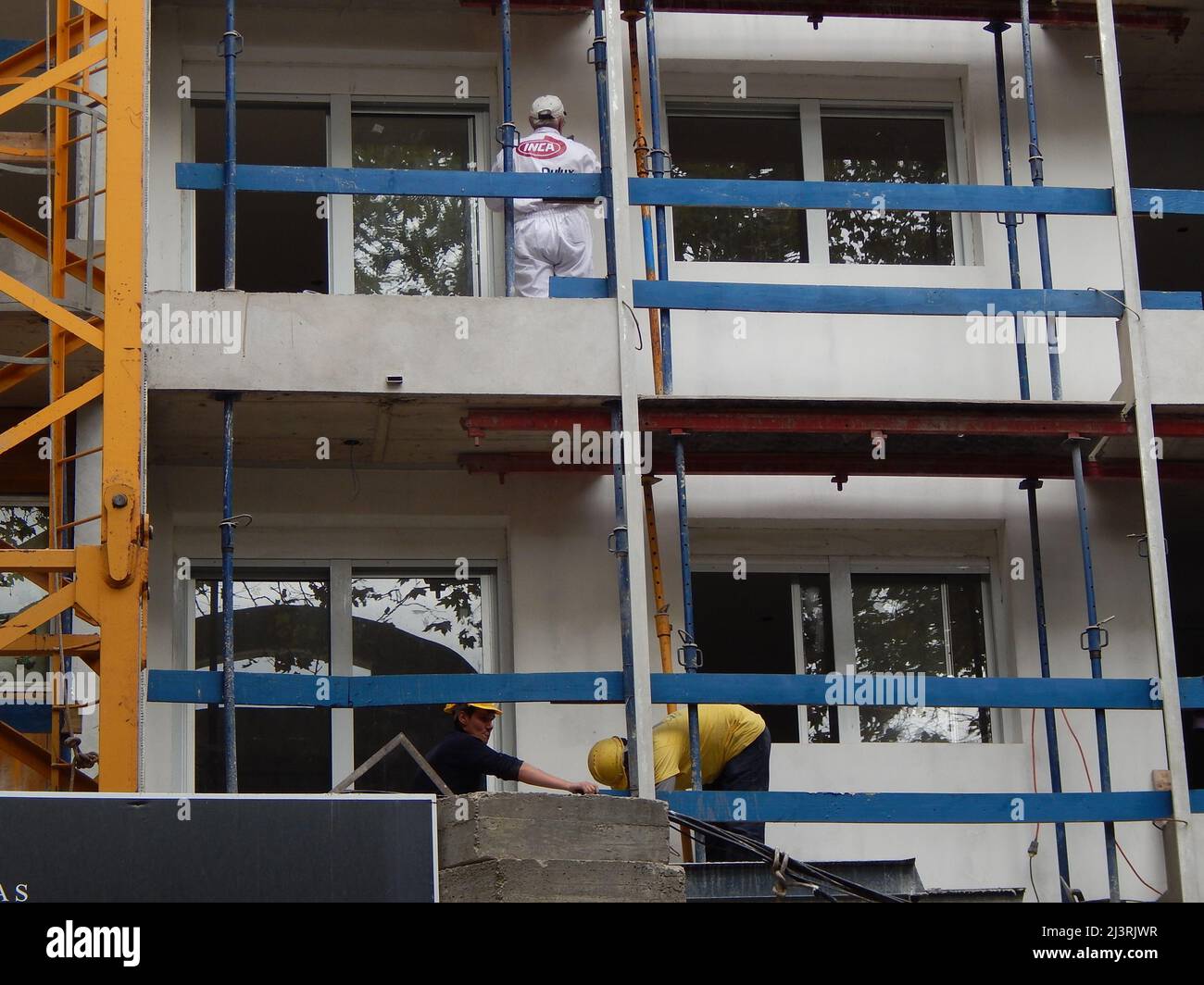 Construction workers in a building under construction Stock Photo - Alamy