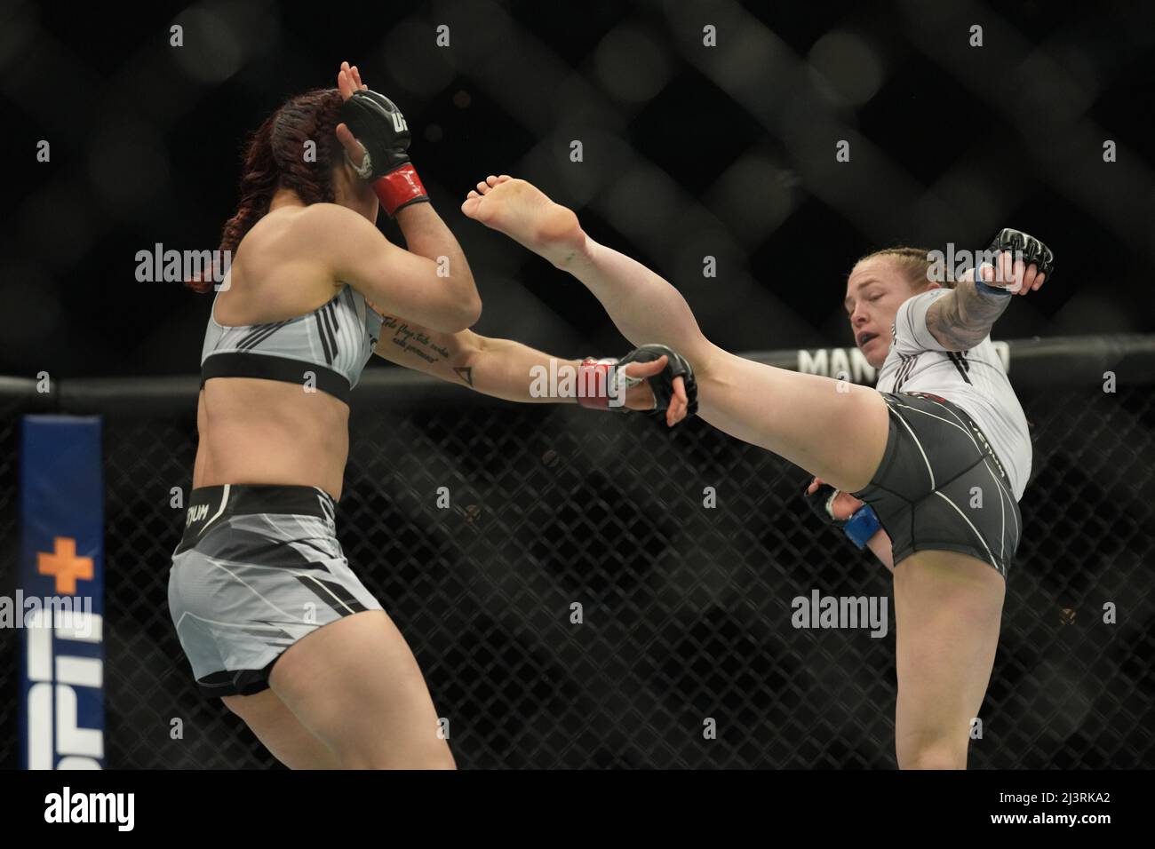 JACKSONVILLE, FL - APRIL 9: (R-L) Kay Hansen kicks Piera Rodríguez in ...