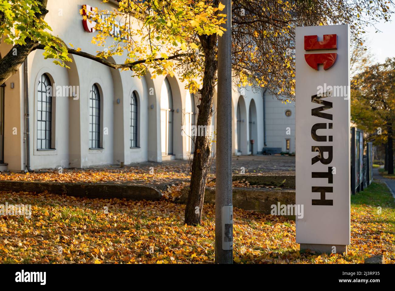 Würth Group logo in front of a store building. The company is known for ...