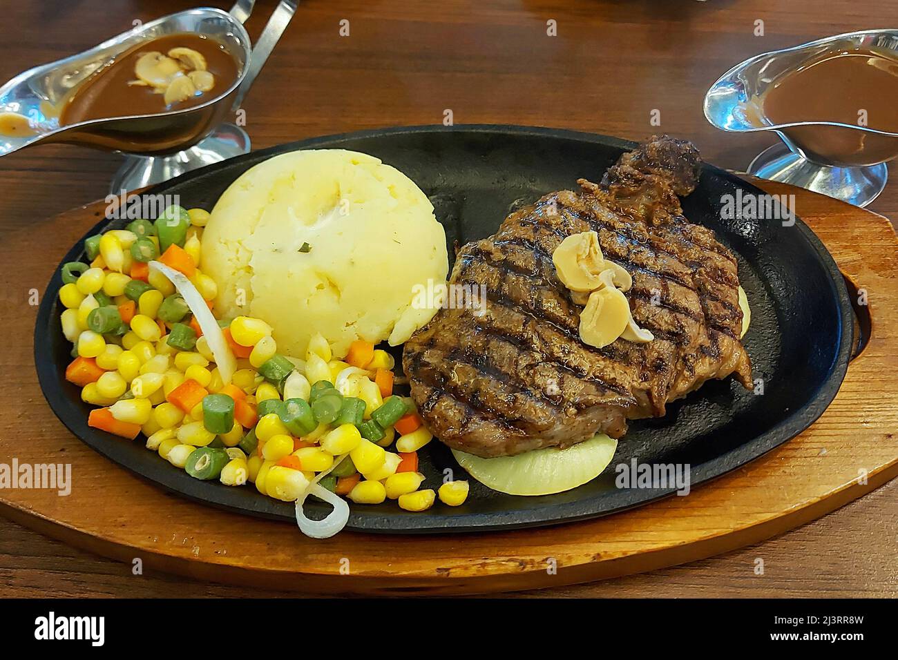 Rib Eye Steak at Steak 21 Resto, Jakarta, Indonesia Stock Photo - Alamy