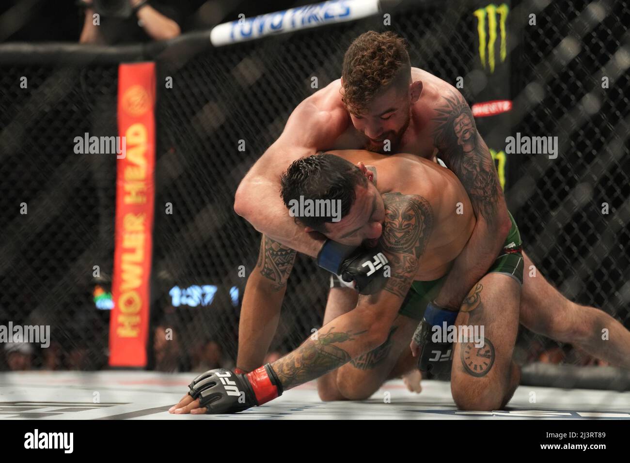 JACKSONVILLE, FL - APRIL 9: Josh Fremd (top) controls the body of ...