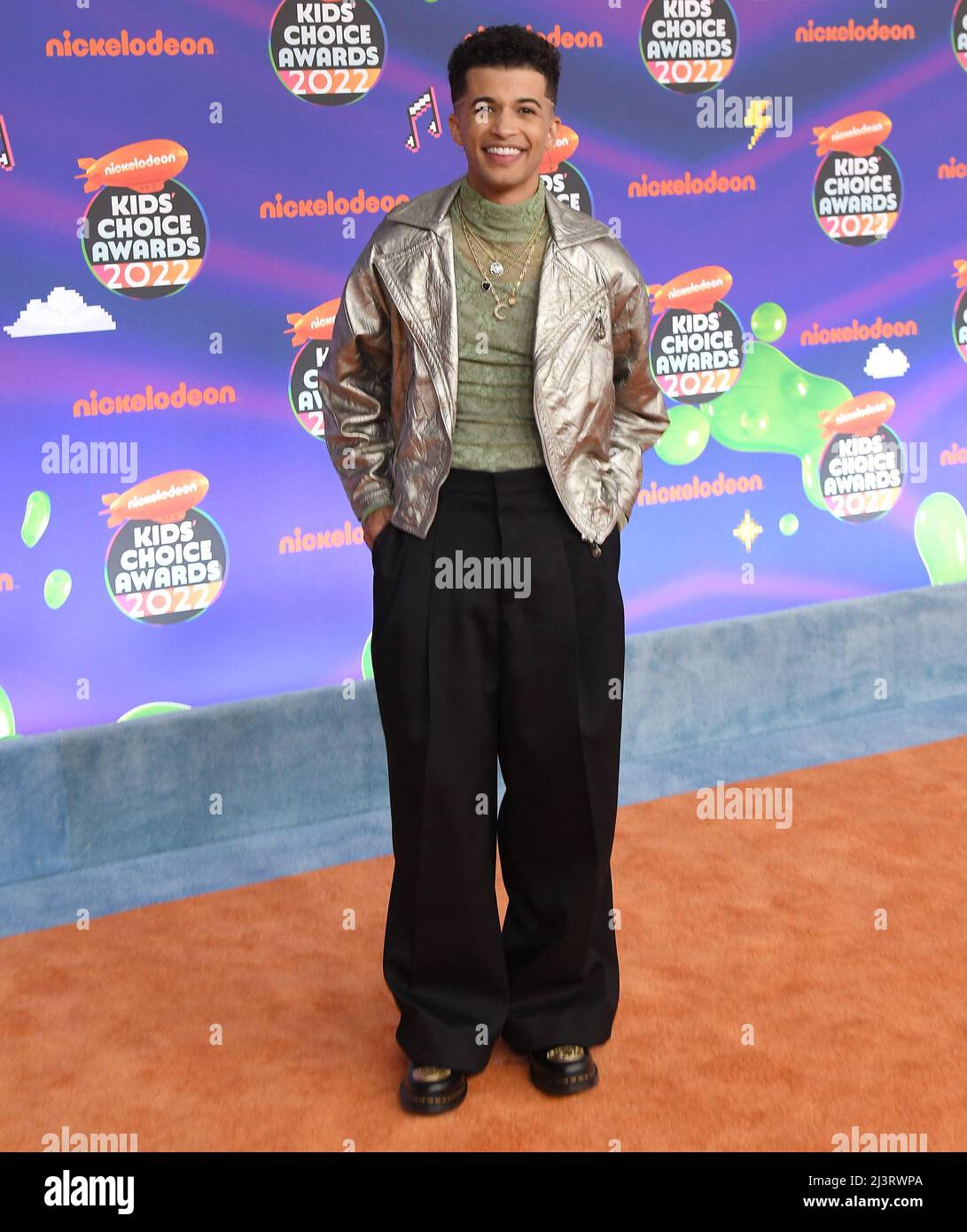 Jordan Fisher arrives at the 2022 Nickelodeon Kid's Choice Awards held ...