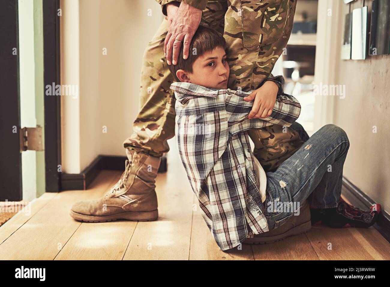 Child clinging father hi-res stock photography and images - Alamy