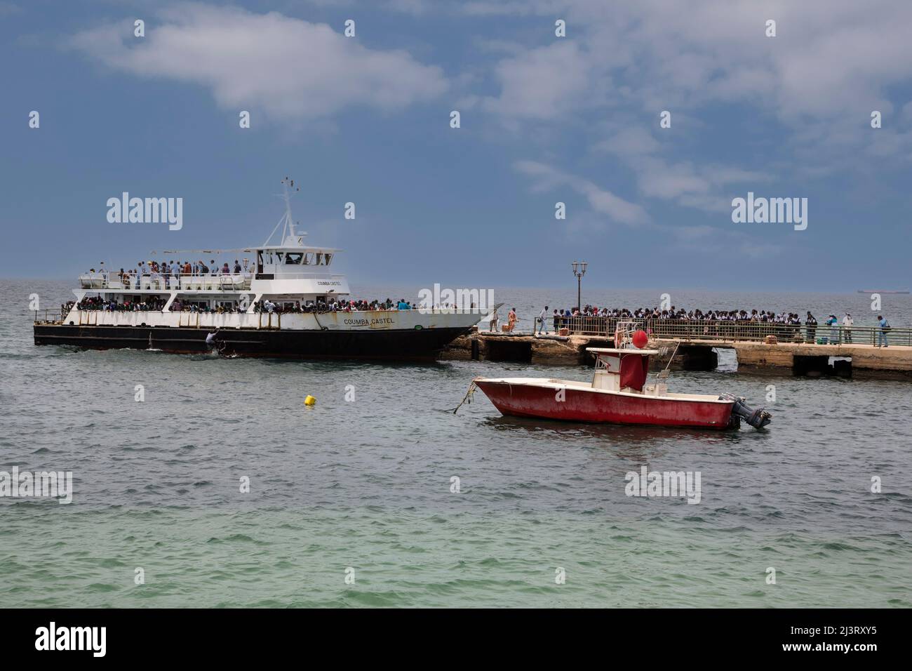 Dakar Ferry Arriving; Returning Passengers Waiting on Pier to Board ...
