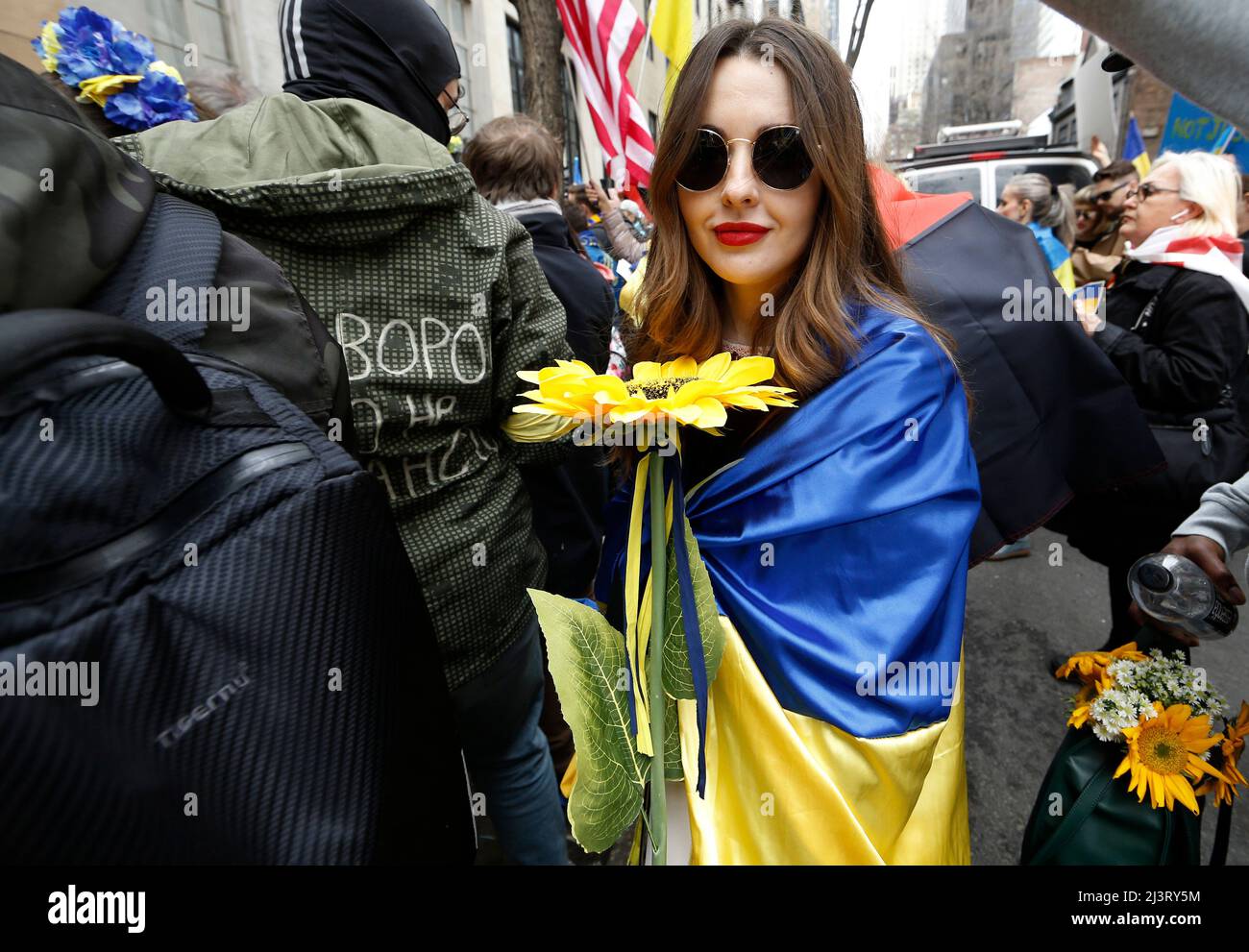 New York City, USA. 09th Apr, 2022. People march through the streets ...