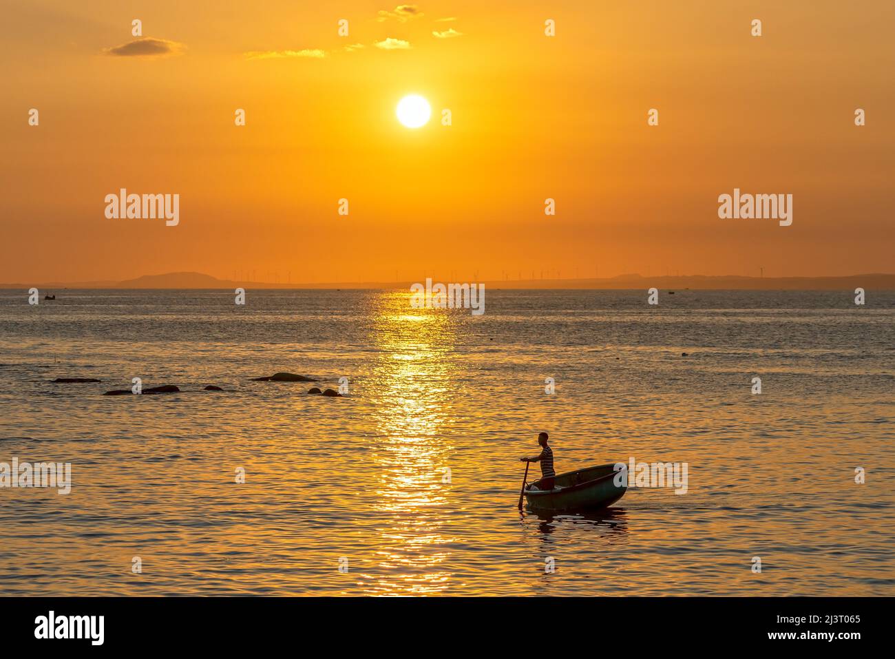 Sunset landscape when fishing boats out to sea to harvest fish end the ...