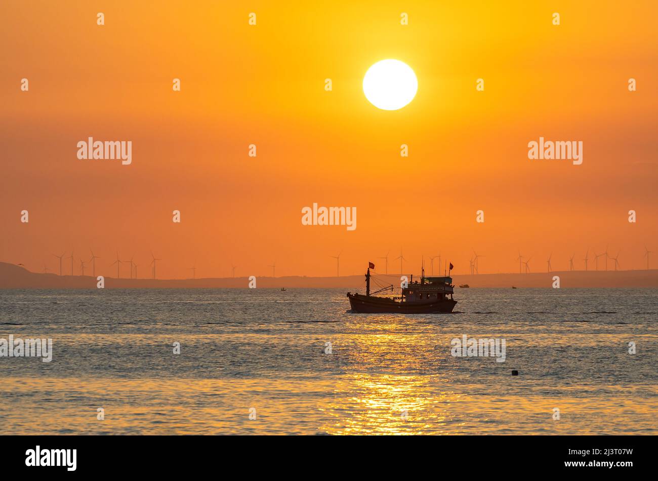 Sunset landscape when fishing boats out to sea to harvest fish end the ...