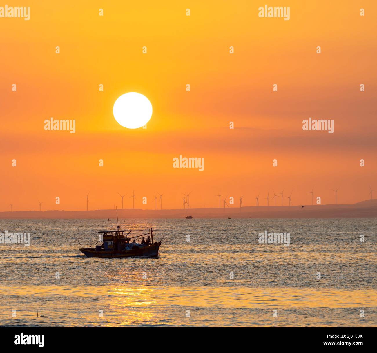 Sunset landscape when fishing boats out to sea to harvest fish end the ...