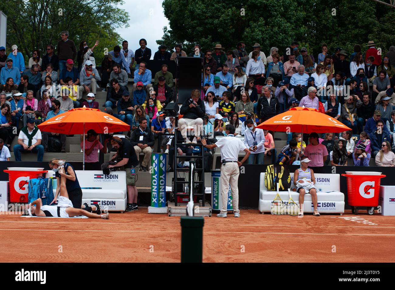 Colombian Camila Osorio is medically assited (Left) and Laura Pigossi ...