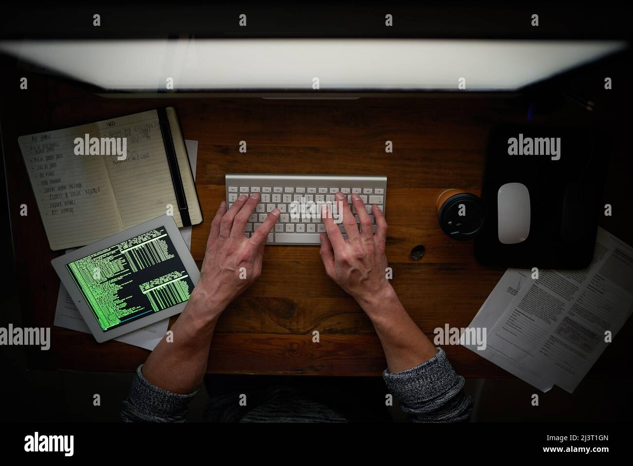 Making It Work No Matter The Hour High Angle Shot Of An Unidentifiable Computer Programmer