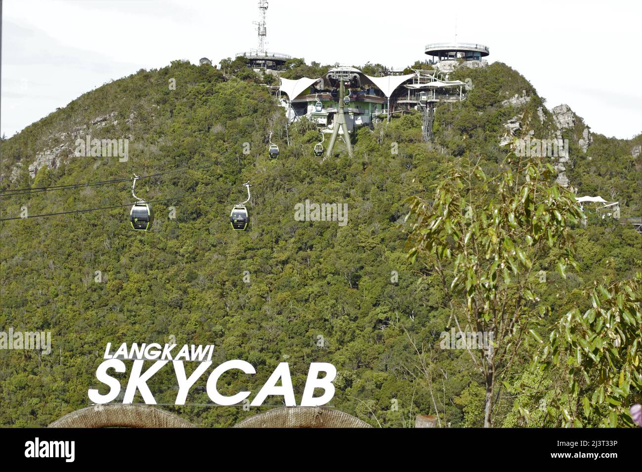 Cable cars or sky cab going up and down at Mat Cincang mountain in ...