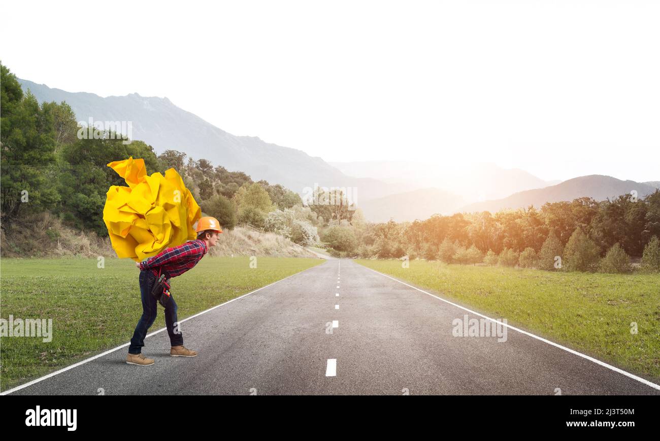 Engineer man carry load Stock Photo - Alamy