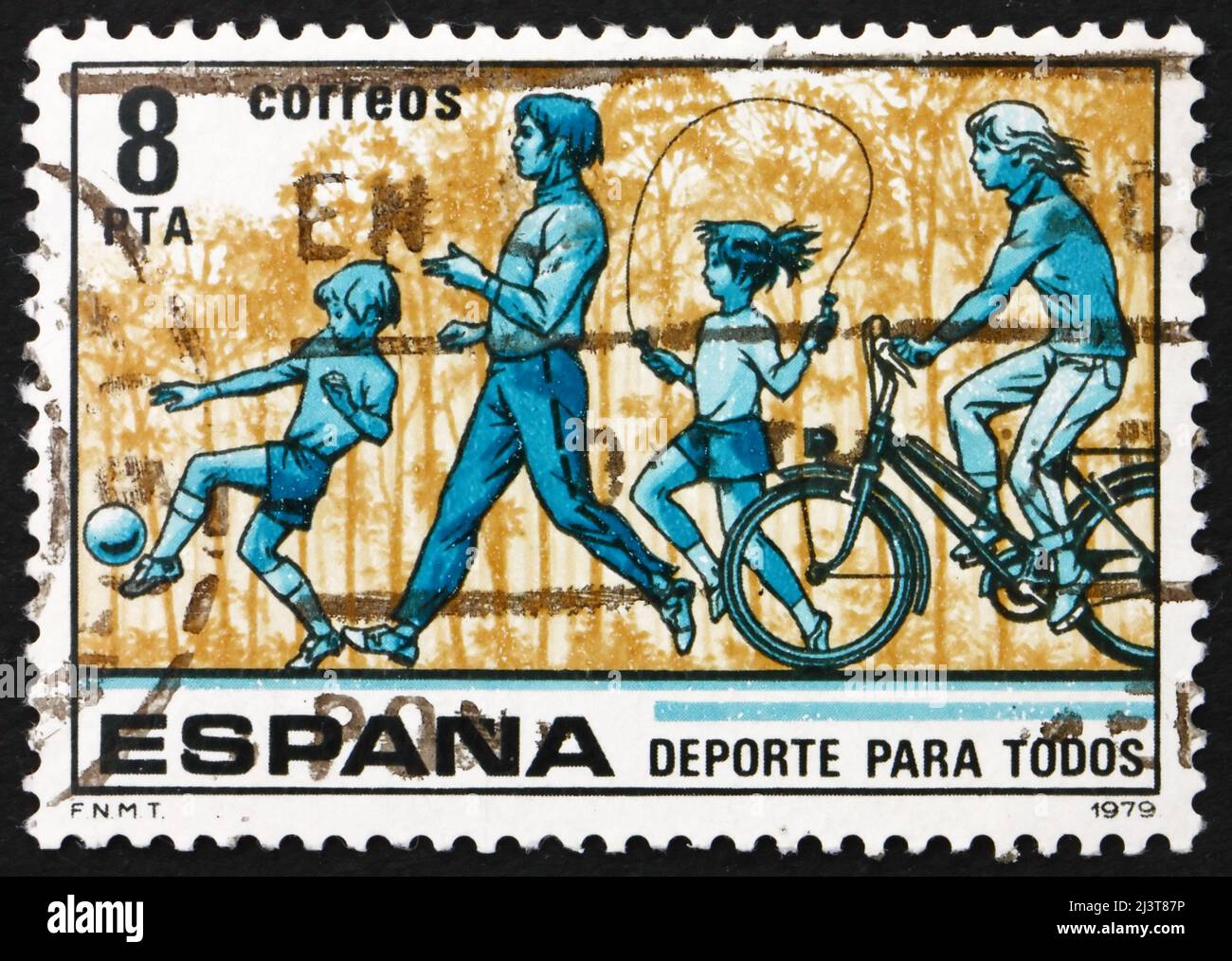 SPAIN - CIRCA 1979: a stamp printed in the Spain shows Children kicking ...