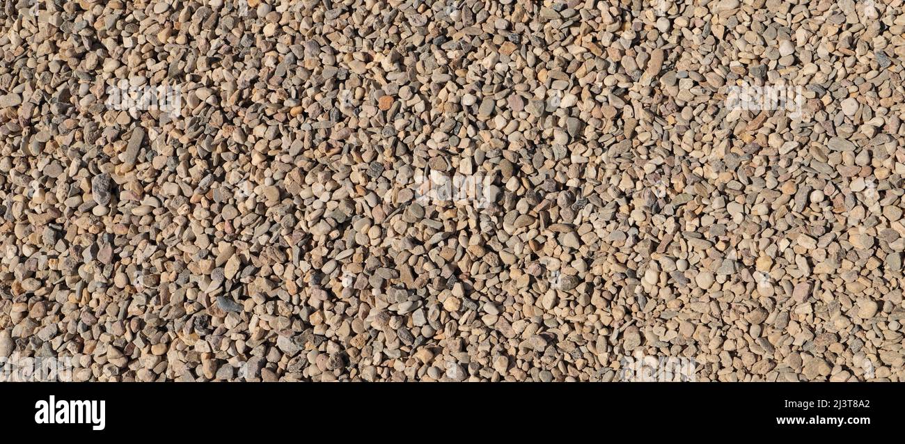 a pile of pebbles as a background Stock Photo - Alamy