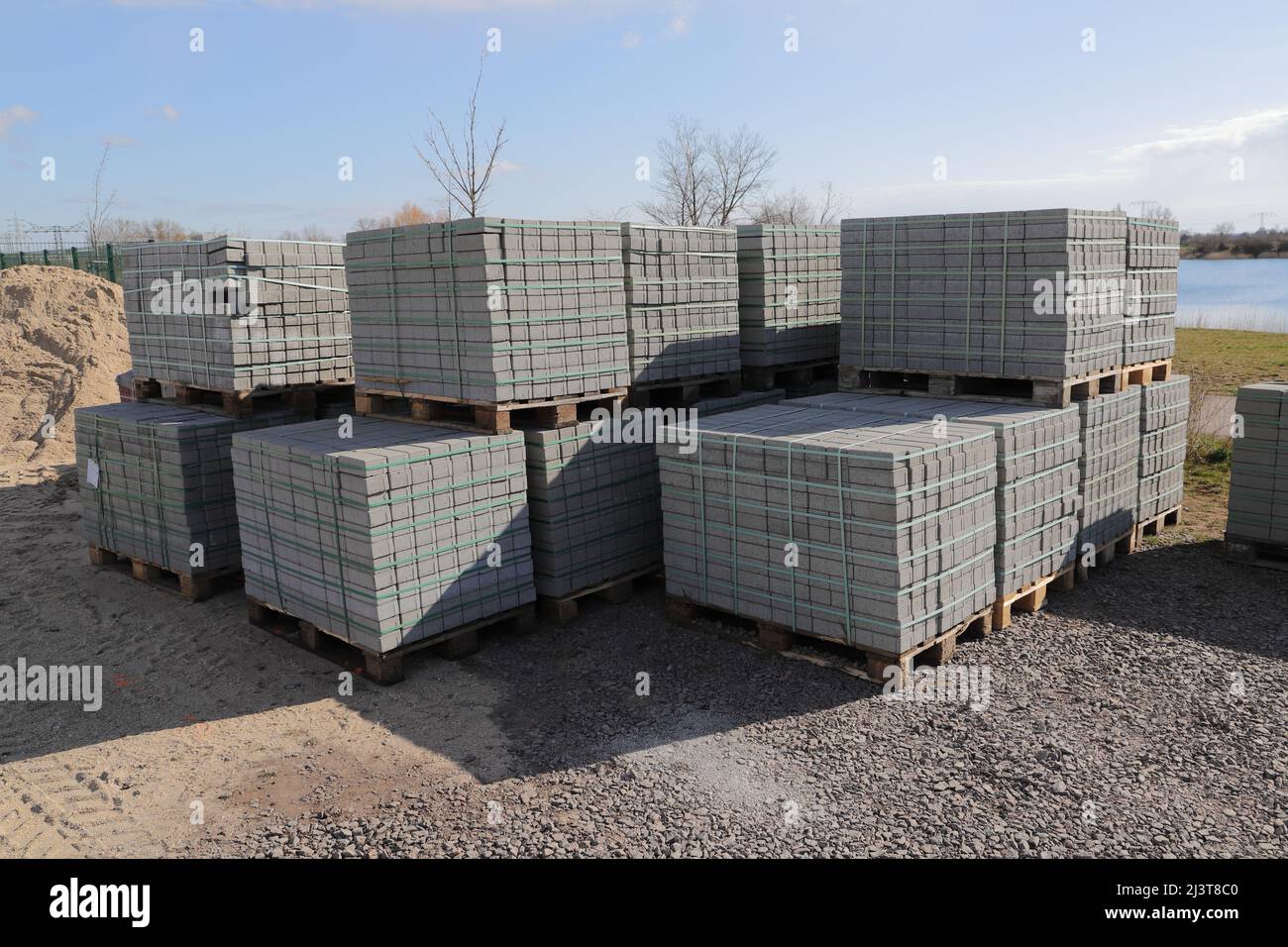 Pallets with stones in a hardware store Stock Photo - Alamy
