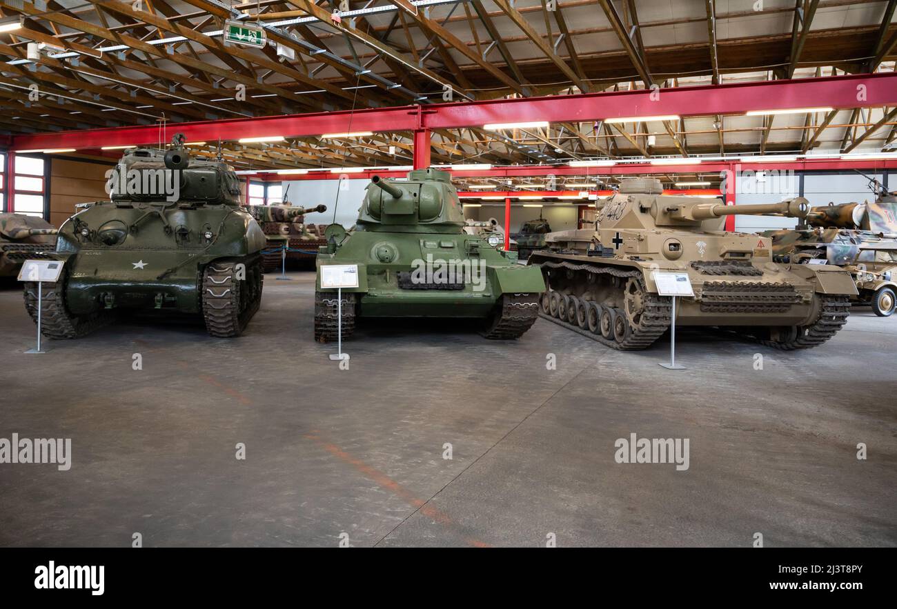 Munster, Germany. 29th Mar, 2022. An American Sherman M4A1 tank (l), a ...
