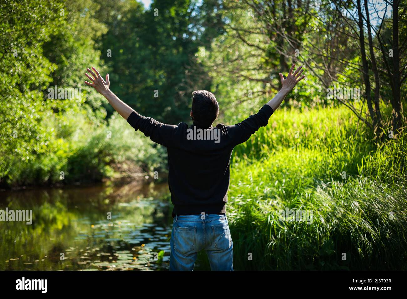 Silhouette of a man from the back at sunset. The male model back to ...