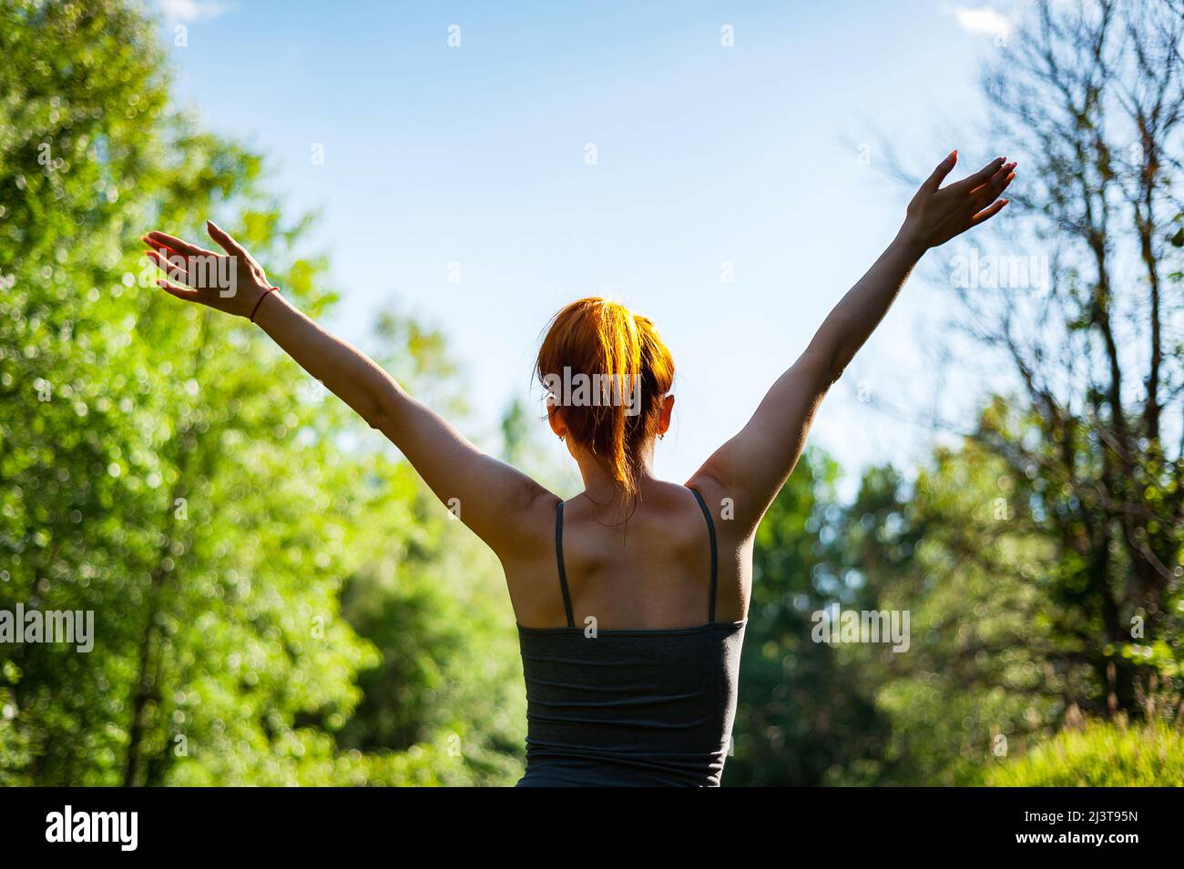 Silhouette of a woman from the back at sunset. Female model back to ...