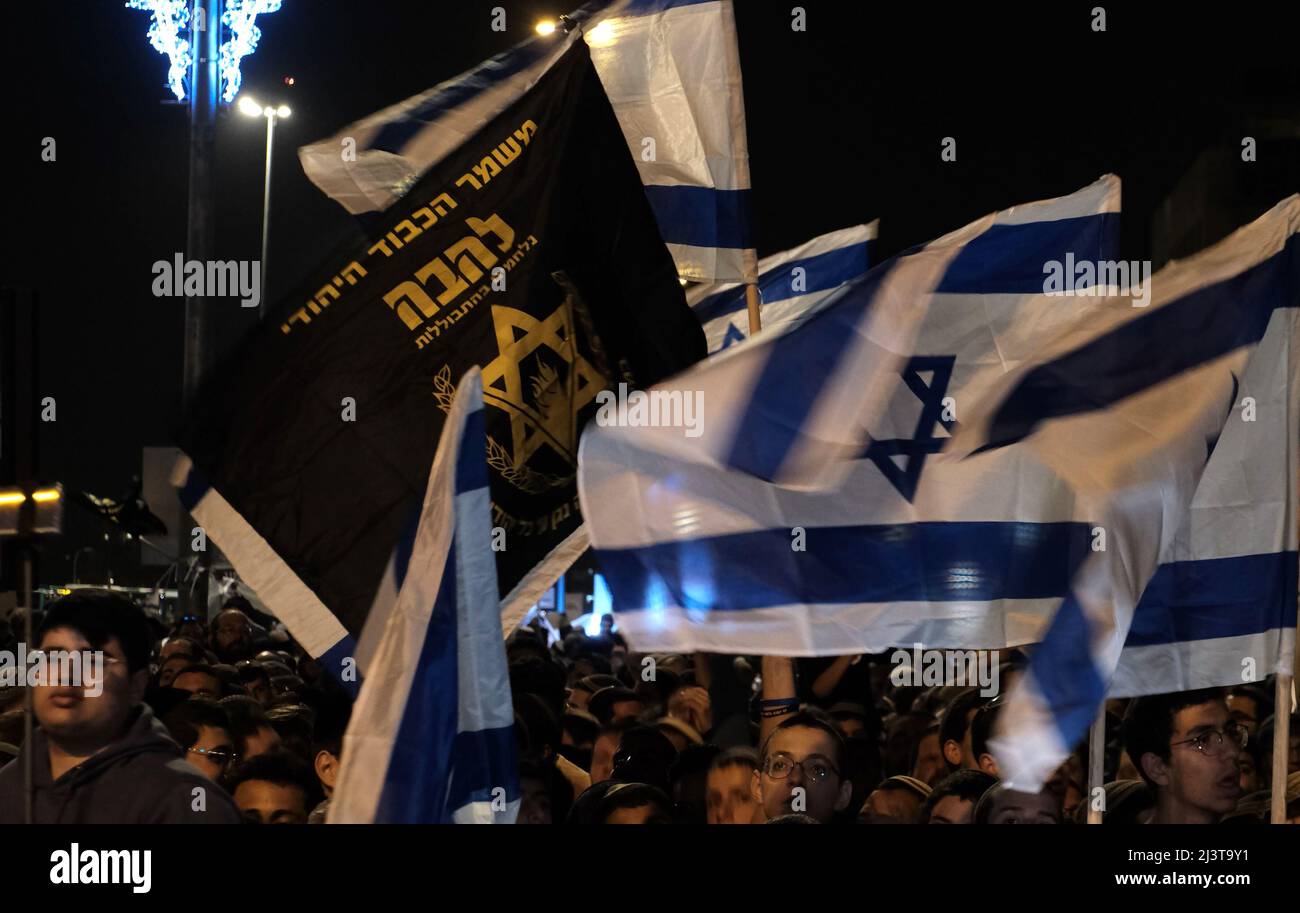 Israeli right wing demonstrators hold Israeli flags and the flag of ...