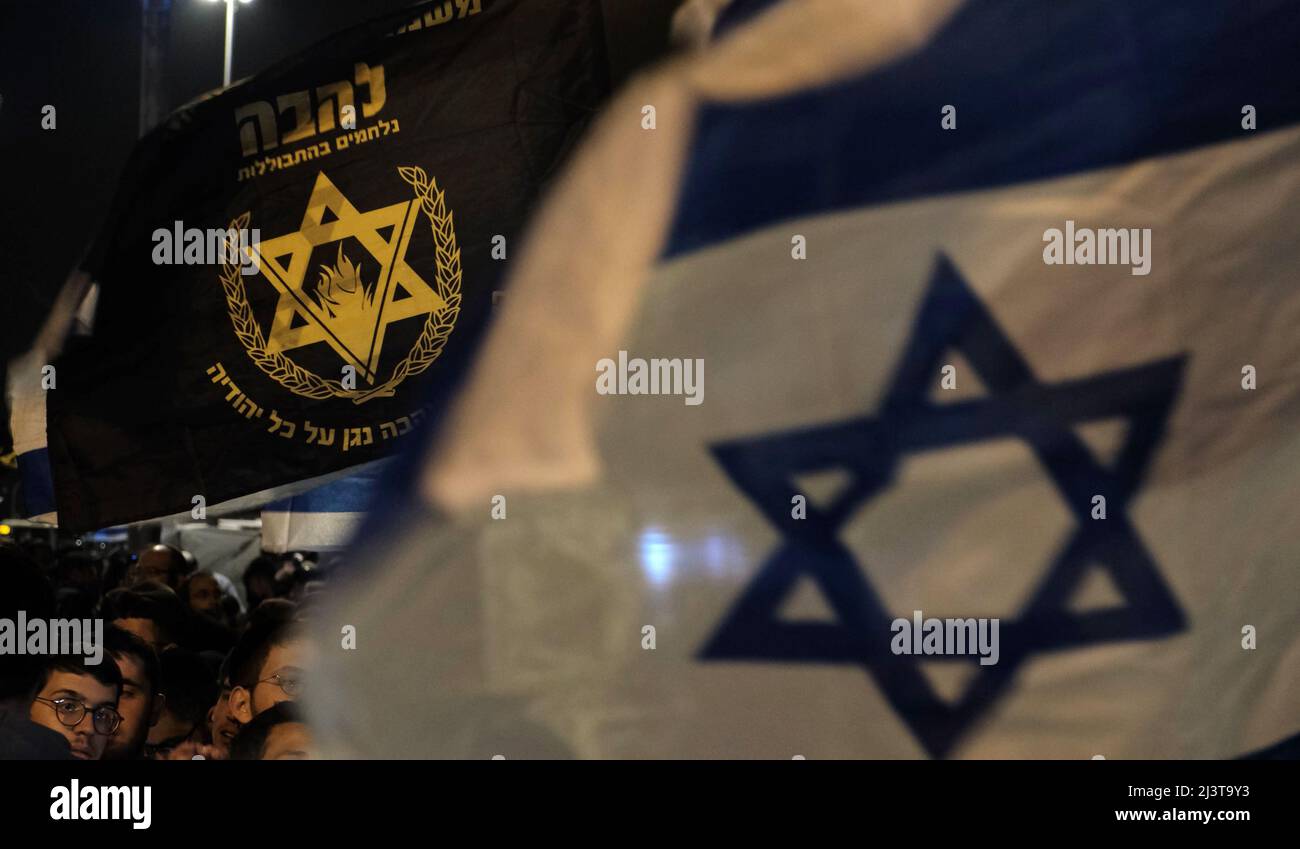 Israeli right wing demonstrators hold Israeli flags and the flag of ...