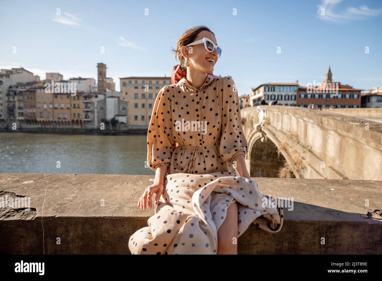 Happy tourist woman arno river hi-res stock photography and images - Alamy
