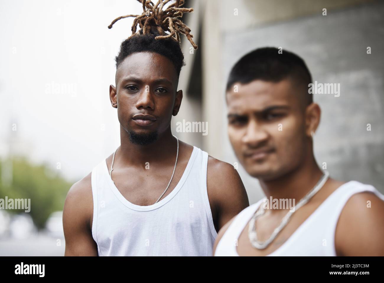 A gang is more than a family. Cropped portrait of two handsome young ...