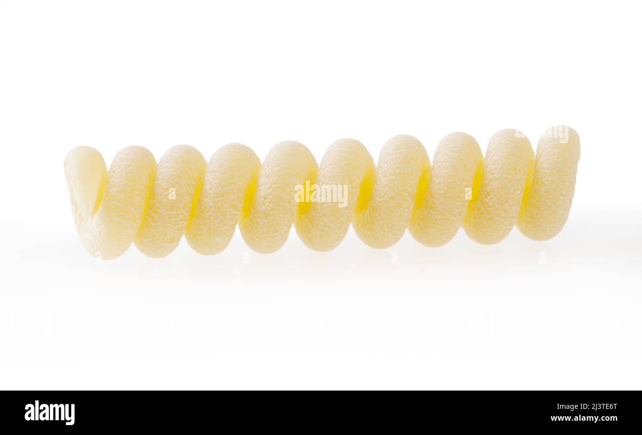 Uncooked fusilli corti bucati pasta isolated on white background with ...