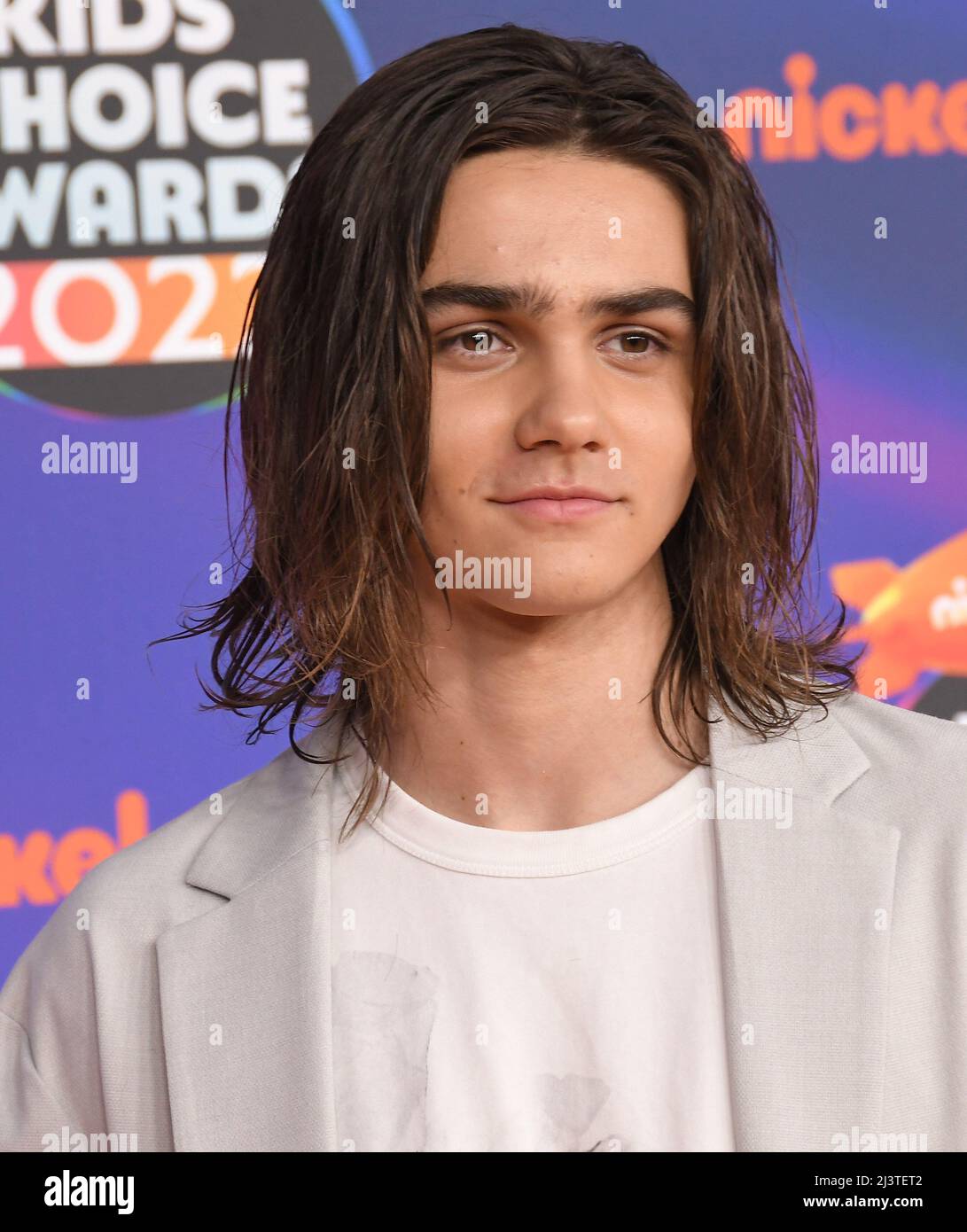 Luca Luhan arrives at the 2022 Nickelodeon Kid's Choice Awards held at ...