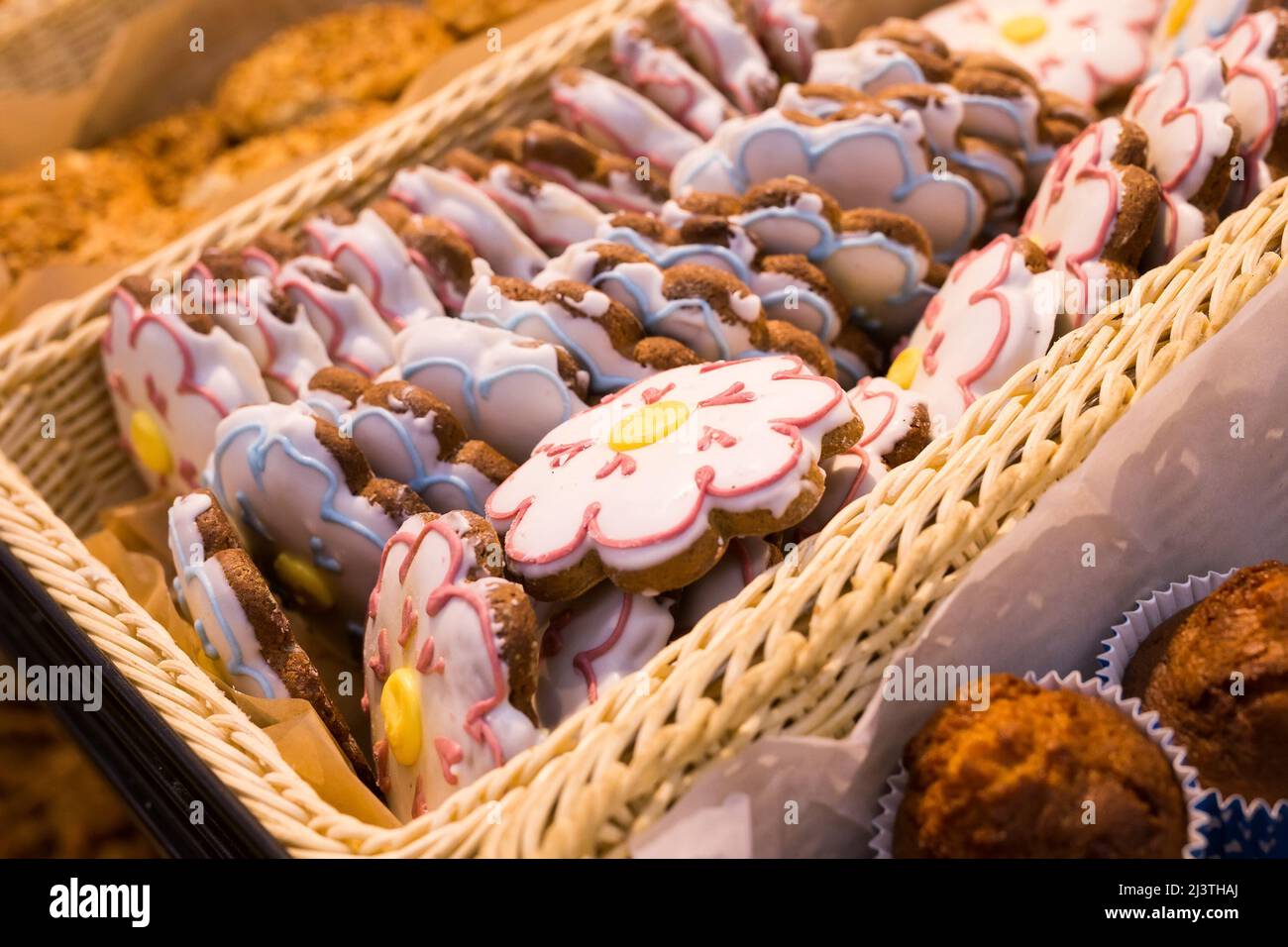 glazed flower shaped pastries on a bakery counter Stock Photo - Alamy