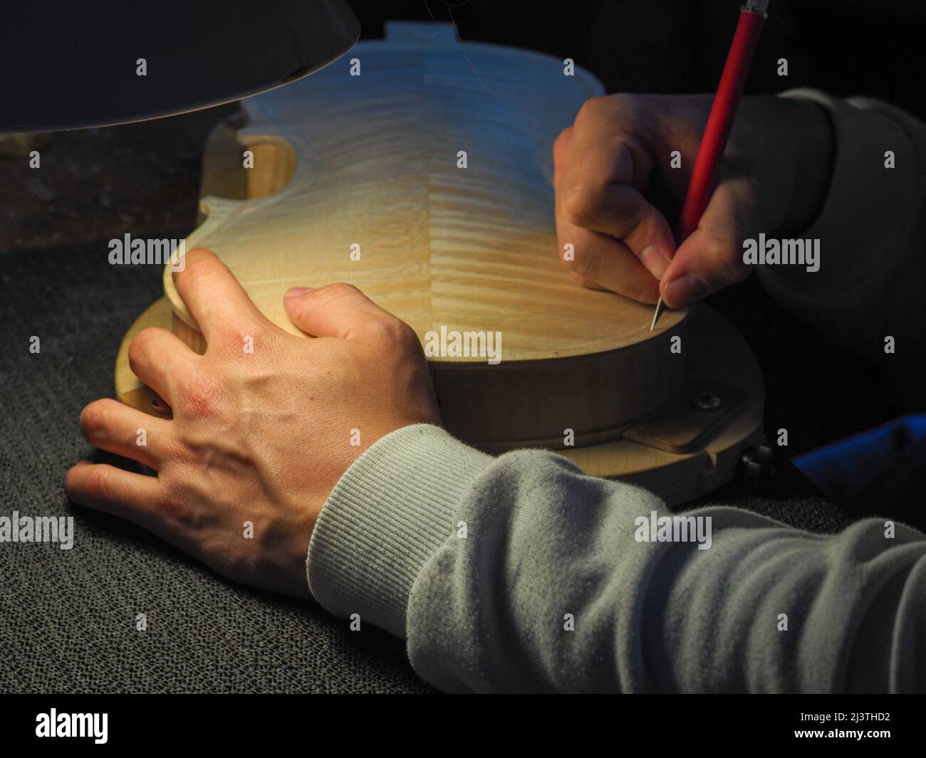 luthier working on a new violin in his workshop Stock Photo - Alamy