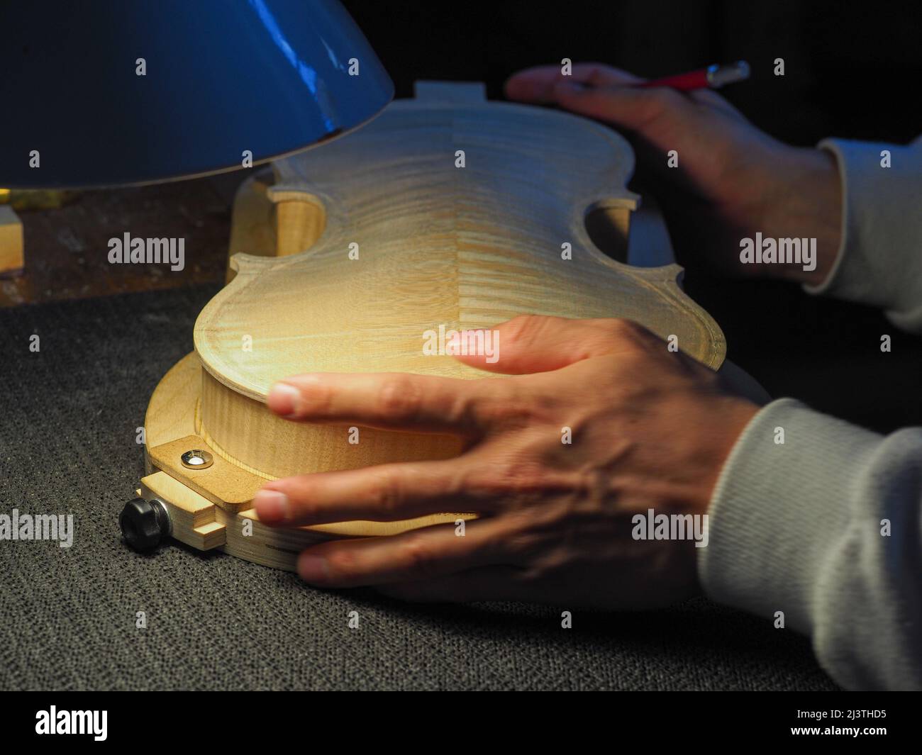 luthier working on a new violin in his workshop Stock Photo - Alamy
