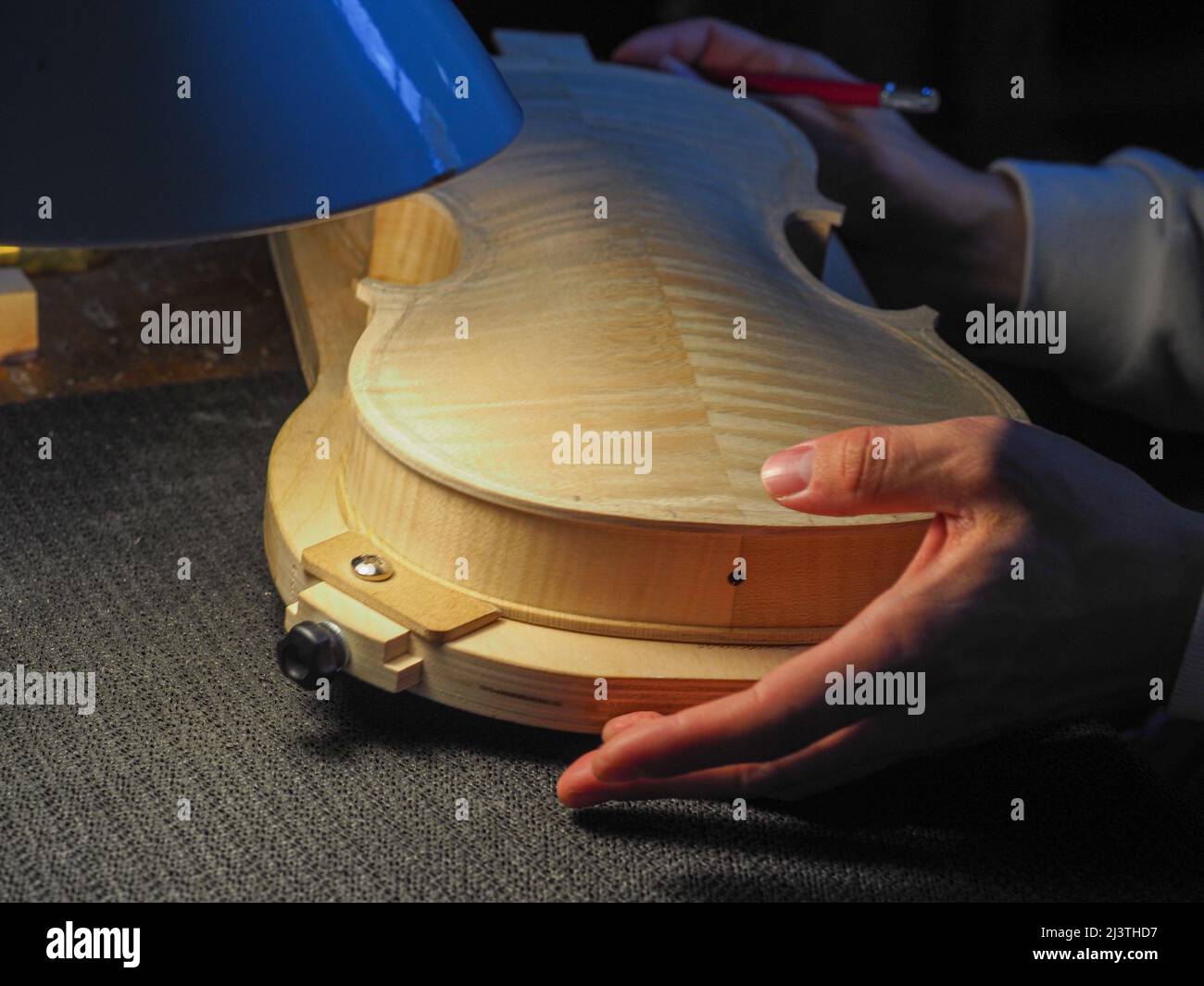 luthier working on a new violin in his workshop Stock Photo - Alamy