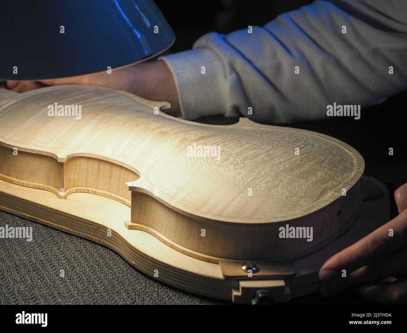 luthier working on a new violin in his workshop Stock Photo - Alamy