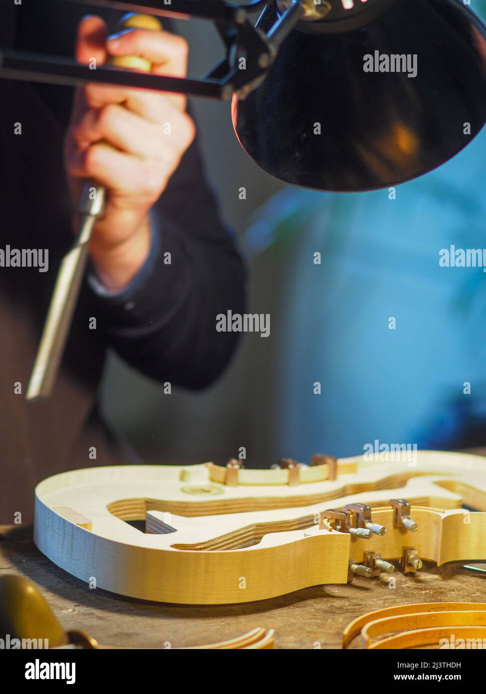 luthier working on a new violin in his workshop Stock Photo - Alamy