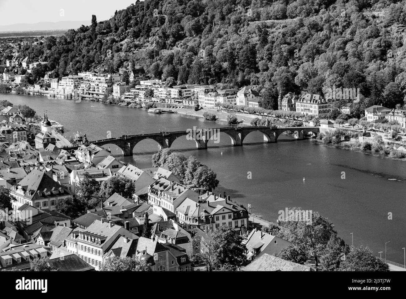 view to river Neckar and Karl Theodor bridge in romantic town of ...