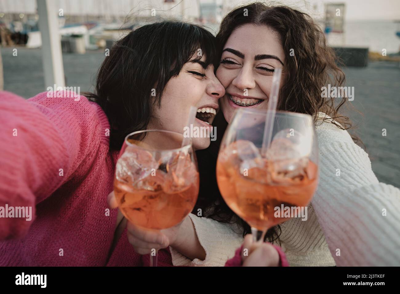 Two girls having drink pub hi-res stock photography and images - Alamy