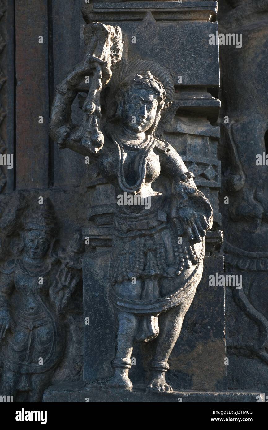 Stone Sculpture of Beautiful Female (Madanikas) with selective focus ...