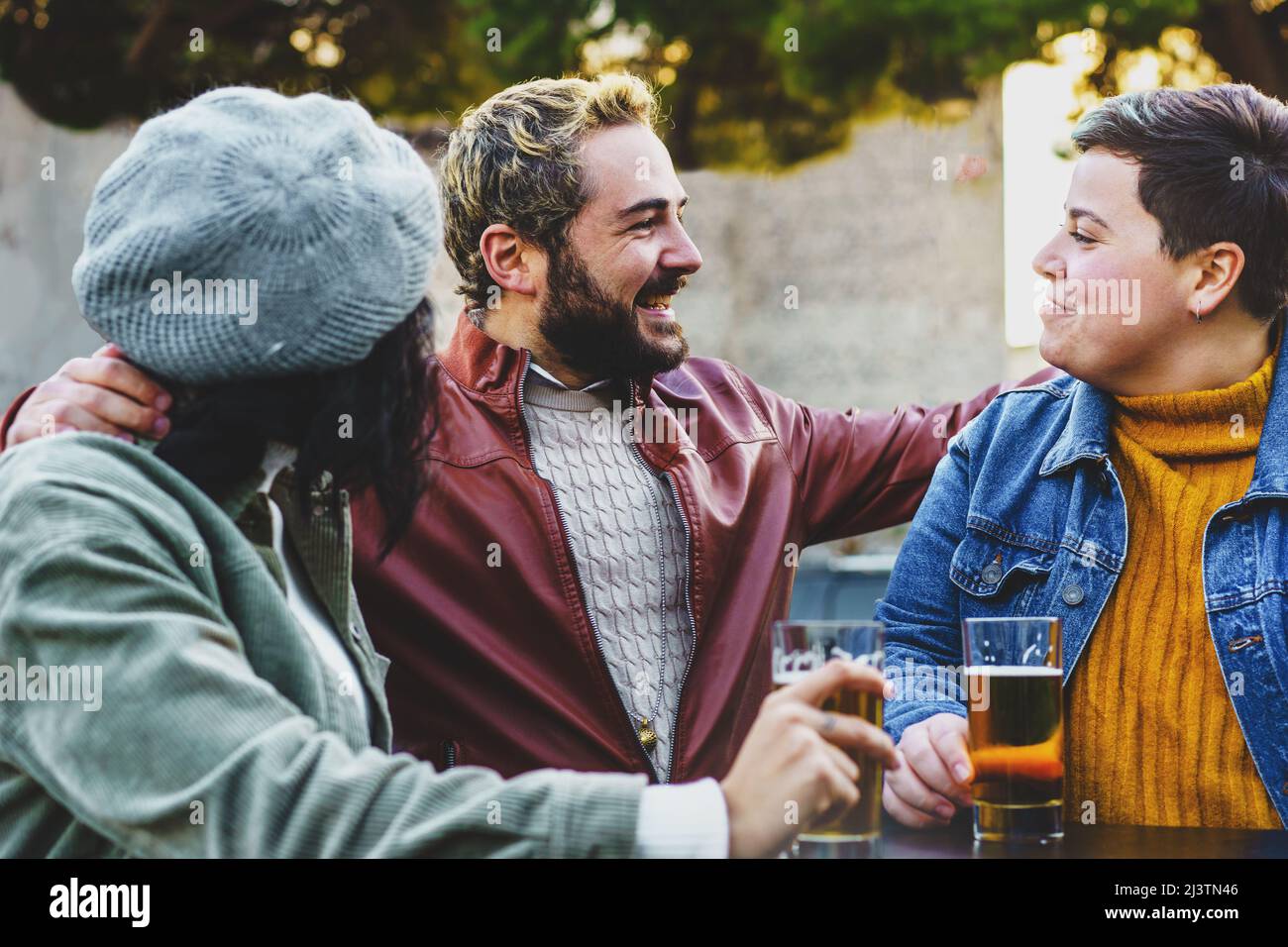 Group of friends talking italy hi-res stock photography and images - Alamy