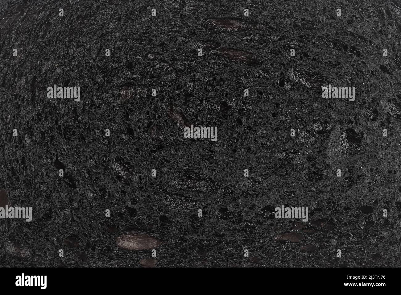 top view macro closeup of black burnt toast bread slice texture ...