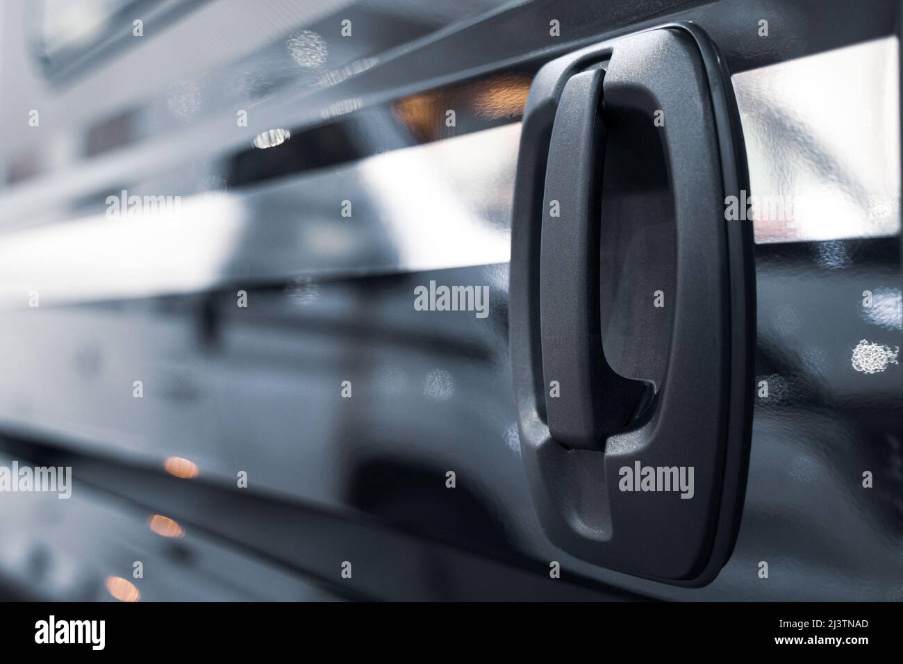 closeup of black car side sliding door handle Stock Photo - Alamy