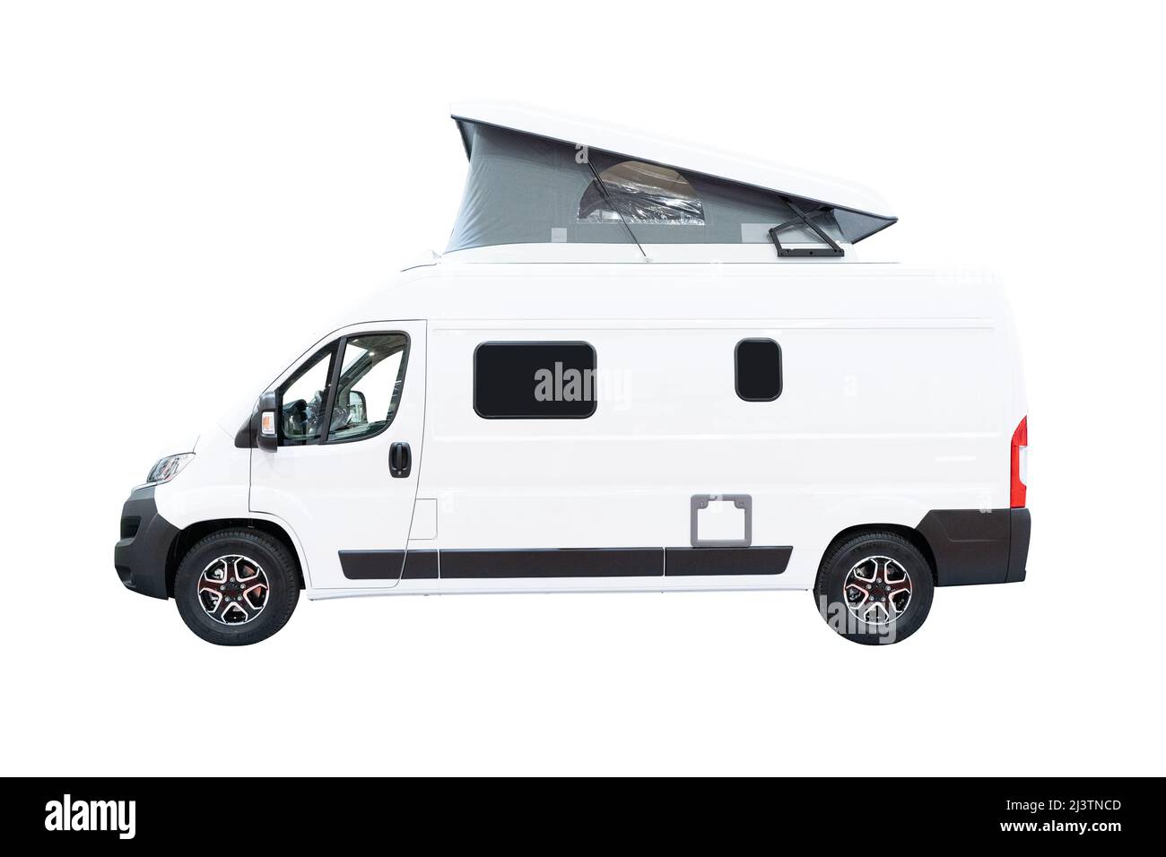 side view of white campervan RV motorhome with open camping tent on top ...