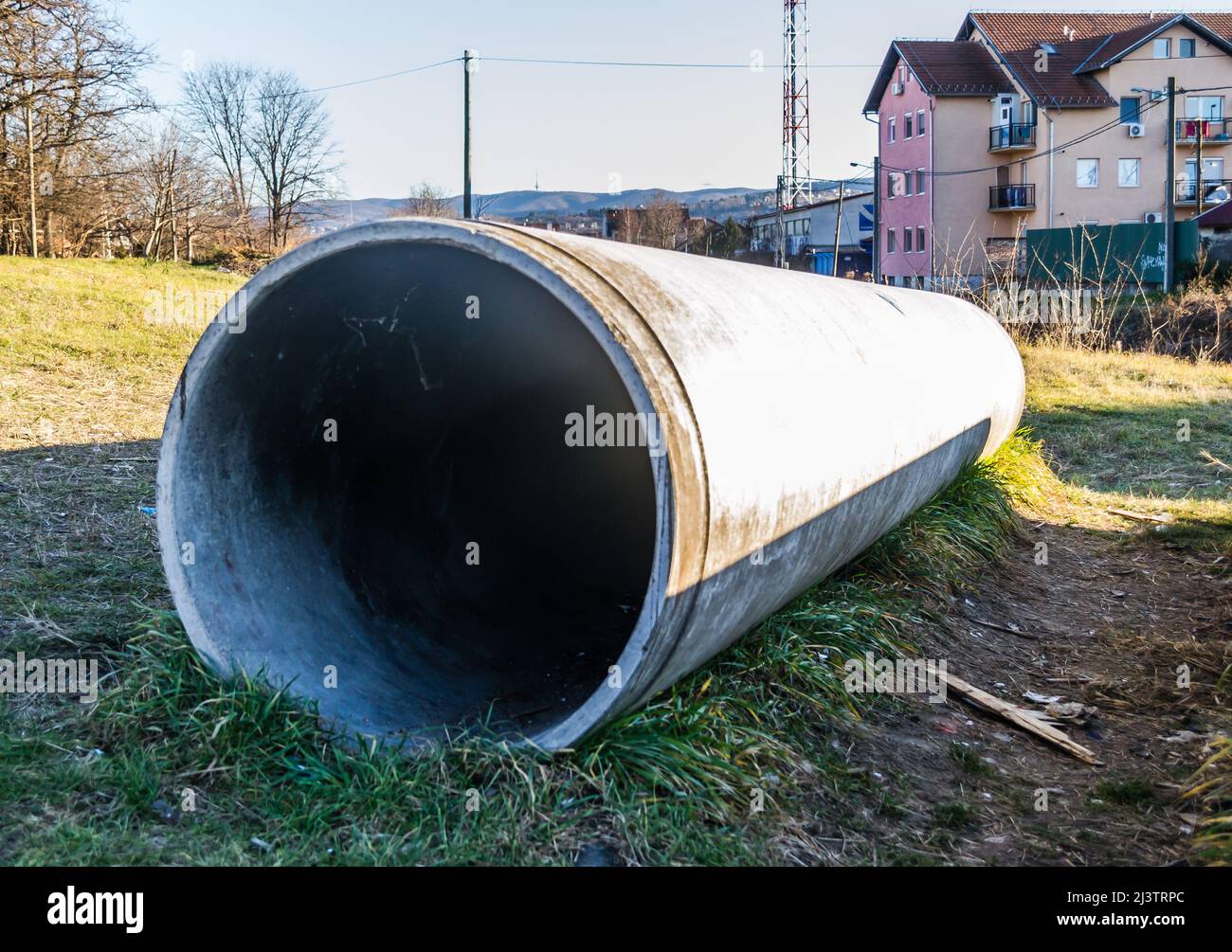 Prepared concrete pipes for sewer system installation Stock Photo - Alamy