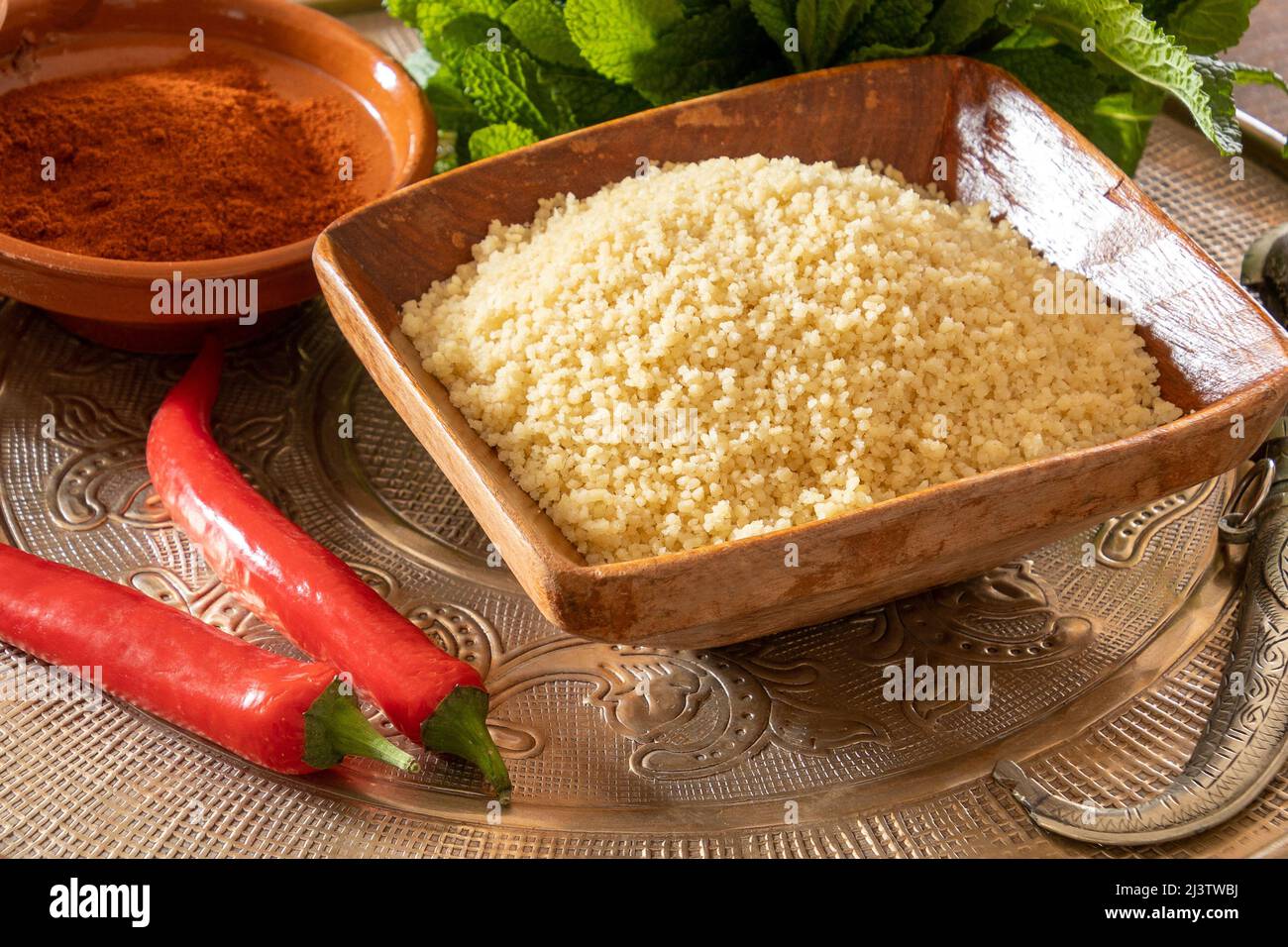 cooked semolina in a bowl on a tray with spices Stock Photo - Alamy